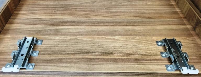 A pair of invisible underbody guides, drawer slides for the showcase ...